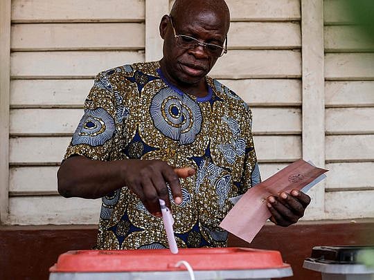 Nigerians vote for new president in tight election race