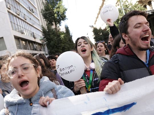 Protests, police raids over Greek train disaster