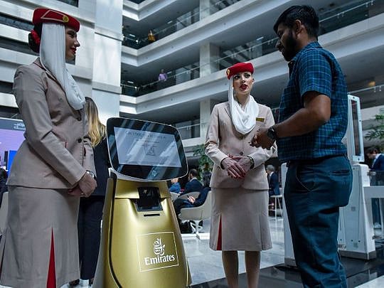 Watch: Flying Emirates? Soon, robots will issue boarding pass, help you ...
