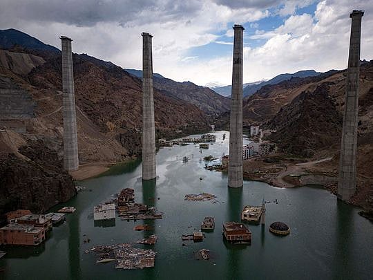 In Photos: Turkish town witnesses slow submergence as tallest dam takes ...