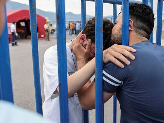 Emotional reunion for Syrian brothers amid despair as Greece searches ...