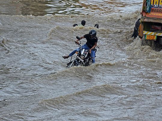 In pictures: Devastating floods cause widespread havoc across the world