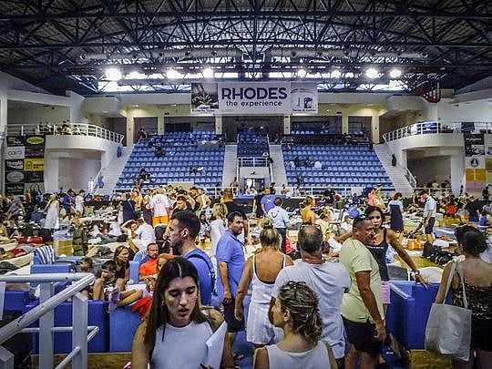 Major airlines cancel flights to Greece's Rhodes as wildfires rage