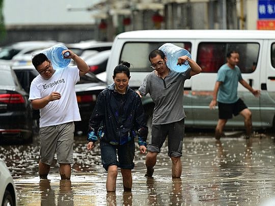 See: Relentless rain turns Beijing roads into rivers in China