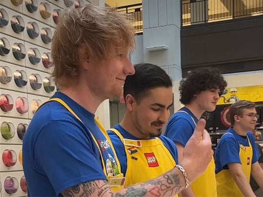 Watch: Ed Sheeran surprises fans by working a shift at Lego store