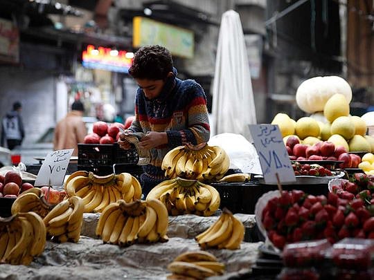 Syria doubles pay for civil servants, military personnel