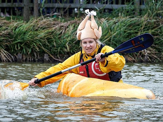Photos: Hundreds race in pumpkin kayaks in annual regatta