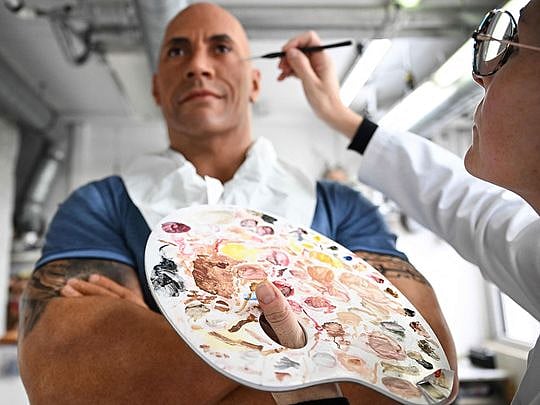 Photos: 'The Rock' waxwork in Paris retouched after skin tone complaints