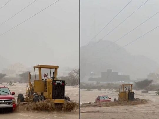 Watch: Saudi uses bulldozer to rescue family trapped in car in flood waters