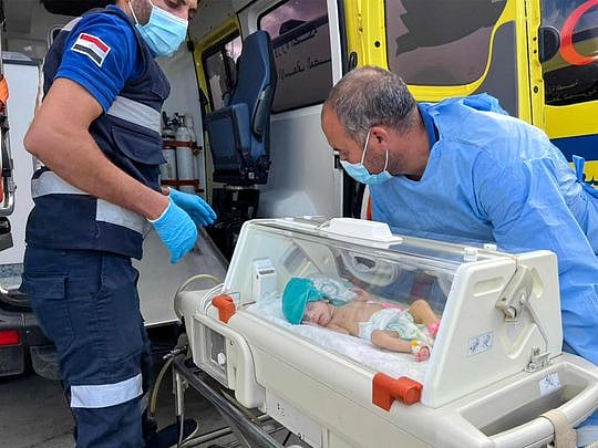 Israeli forces battle militants around another Gaza hospital