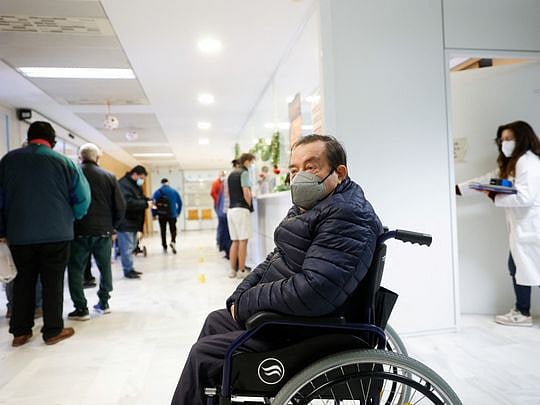 Spain re-imposes masks in hospitals as flu, COVID hit Europe