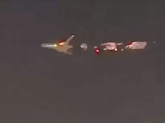 Watch: Boeing cargo plane catches fire mid-air, video shows flames ...