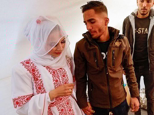 Watch: Palestinian couple hold wedding in a tent near Gaza’s border ...