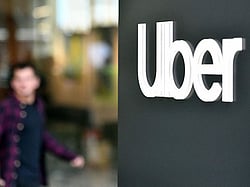 Uber posts first annual net profit since IPO