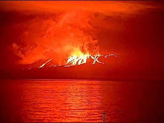 Volcano on uninhabited Galapagos island erupts, sends lava flowing to sea