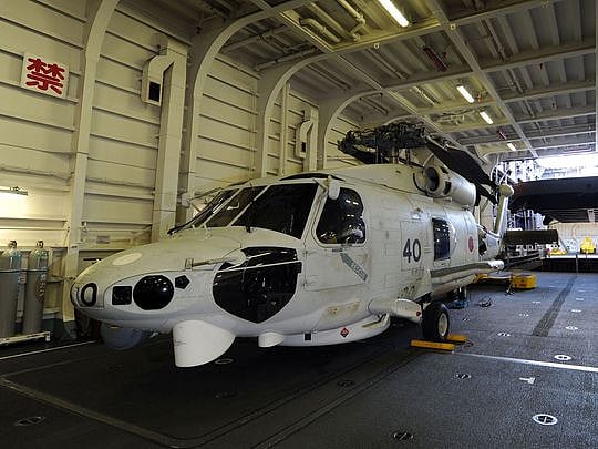 One dead, seven missing after two Japanese military helicopters crash