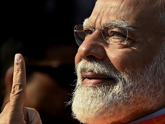 India’s Modi casts his vote as giant election reaches half-way mark