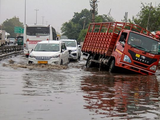 Eleven dead in Indian capital after heavy rain, flight operations stutter