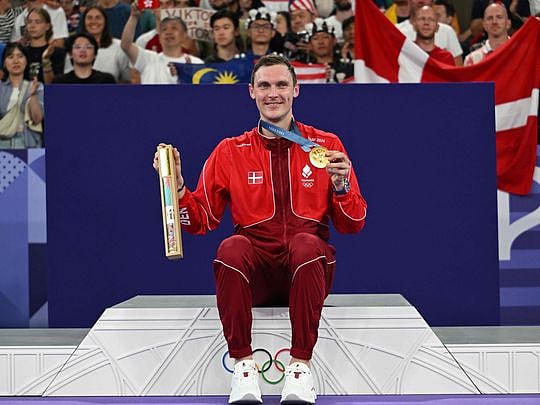 'King' Axelsen emulates Lin Dan in retaining Olympic badminton crown