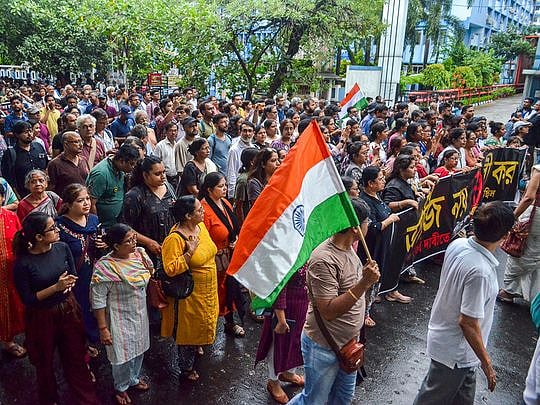Striking Indian doctors to resume work after murder protest