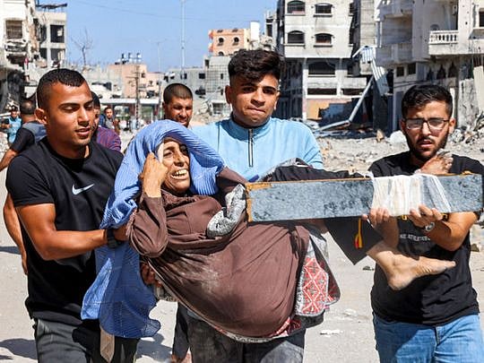 Israel ramps up Gaza shelling, blocks aid routes, rescuers say