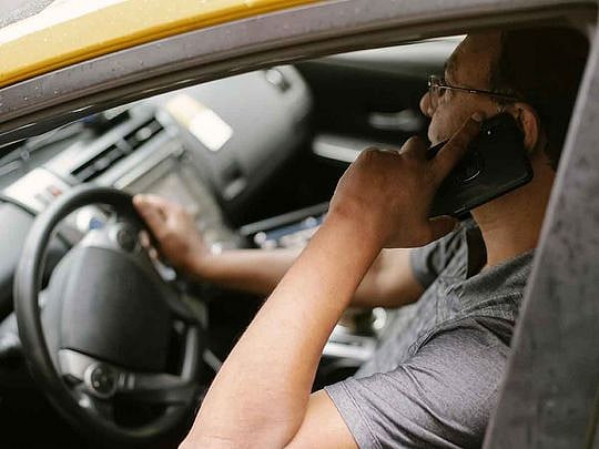 New rules in Dubai: 30-day vehicle impounding for using mobile phone ...
