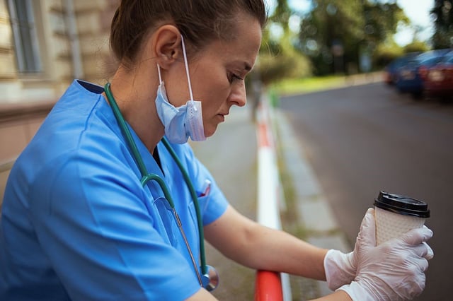 Long COVID Burden Decreased Over Time in Health Care Workers