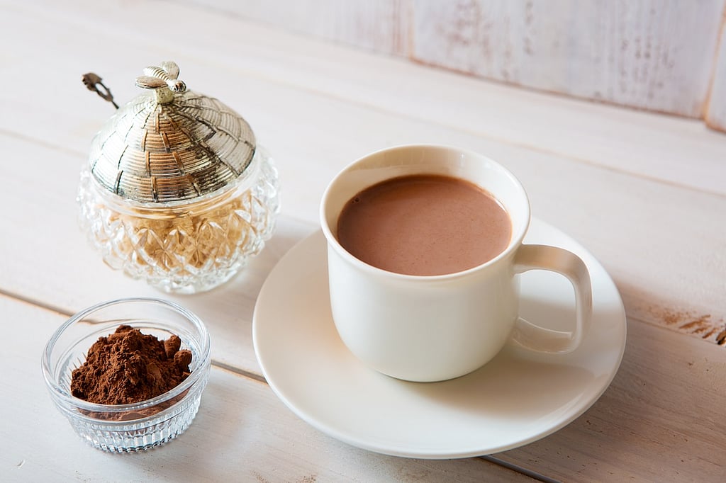 Sip Cocoa Or Munch Berries To Protect Heart Health While Sitting