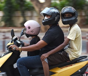 Continue with helmet rule for pillion riders