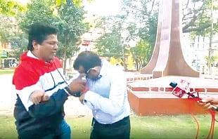 ‘Paint’ attack on activist opposite police HQs sparks public outrage ...