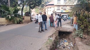 The road behind Milagres Church in Mapusa is riddled with potholes ...