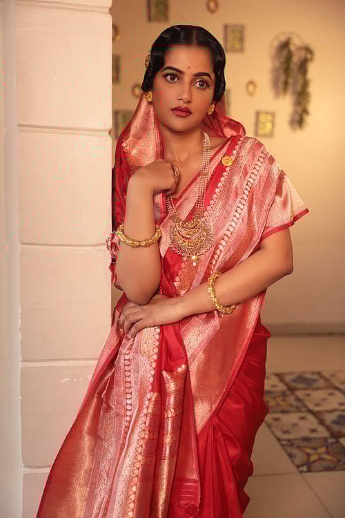 Actor Ushasi Ray as a modern bride in this purple Benarasi
