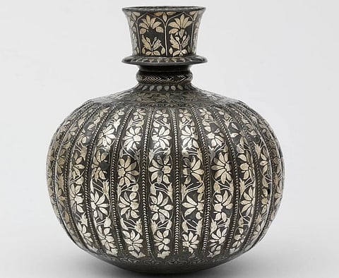 Traditional metal inlay techniques from India