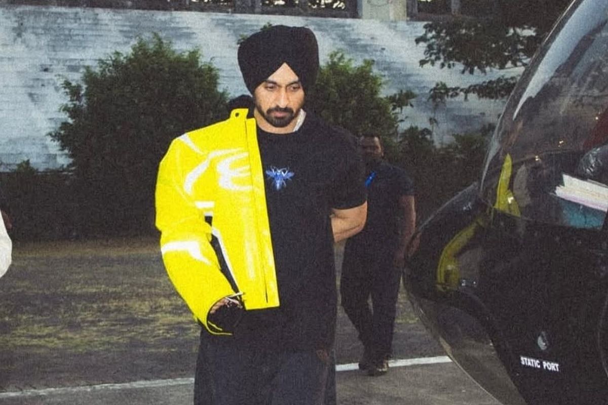 Diljit Dosanjh turns heads in a Balenciaga neon racer jacket worth over ...