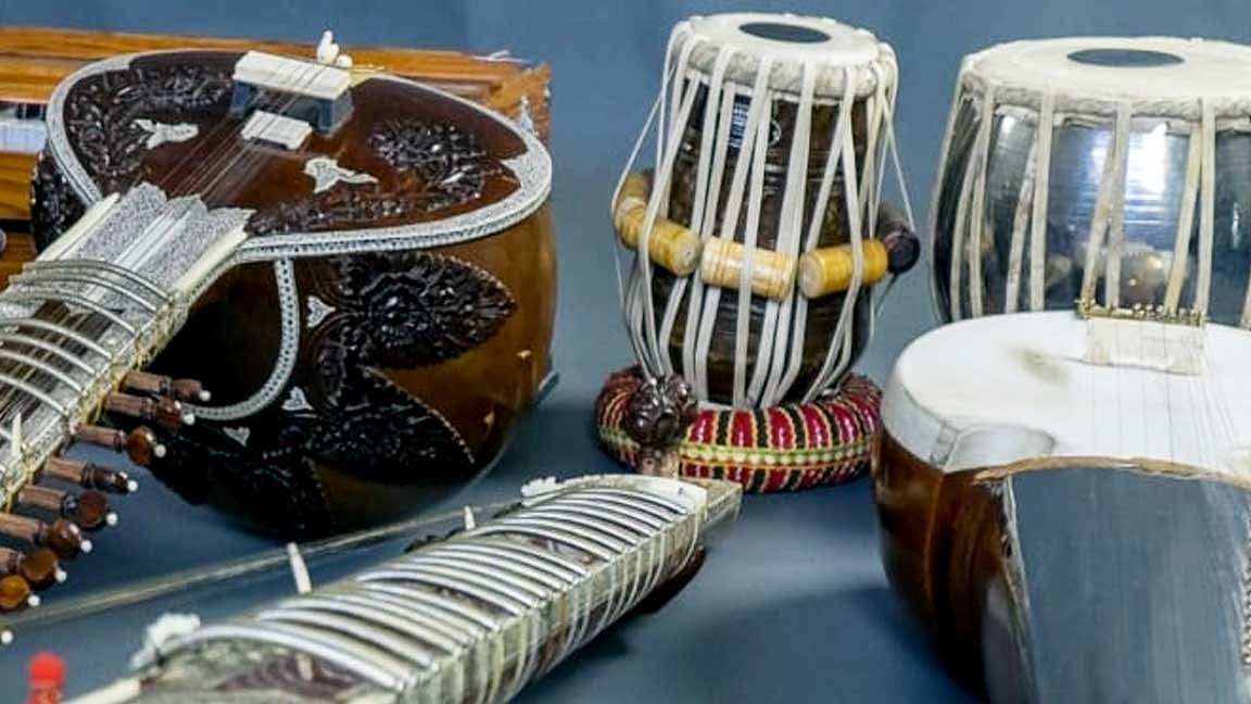 Why worship wooden musical instruments as Saraswati?