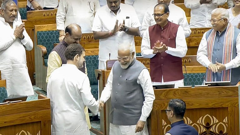 In rare gesture, PM Modi, Rahul Gandhi shake hands in Lok Sabha