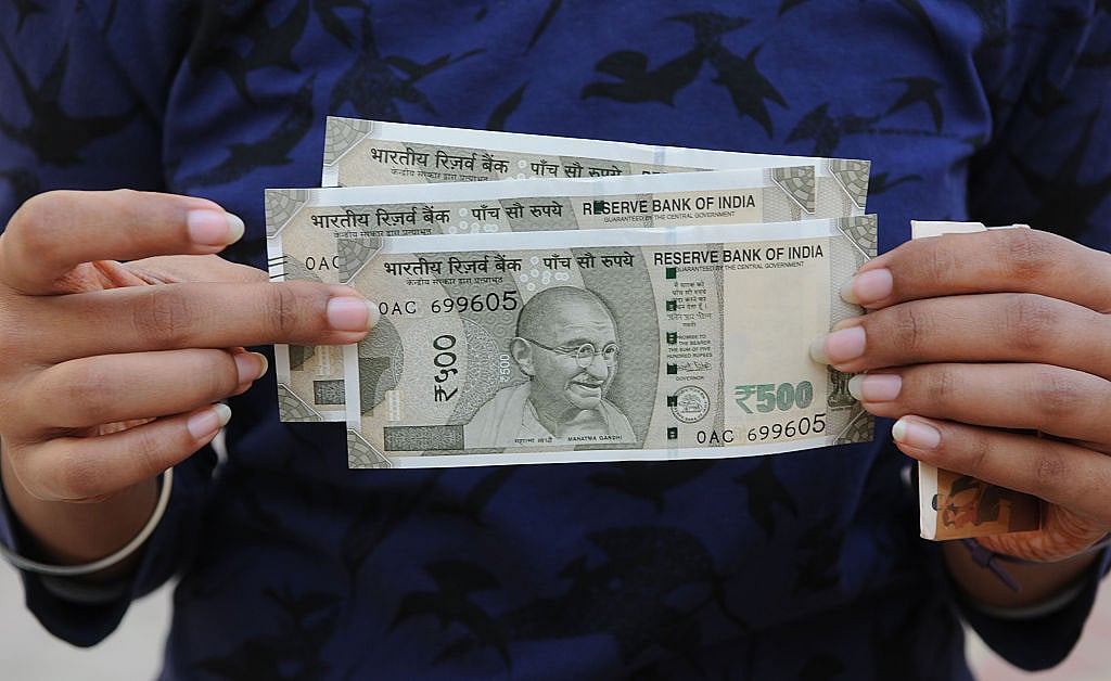 Six years on, cash usage grows, but Rs 2000 banknote turns into ...