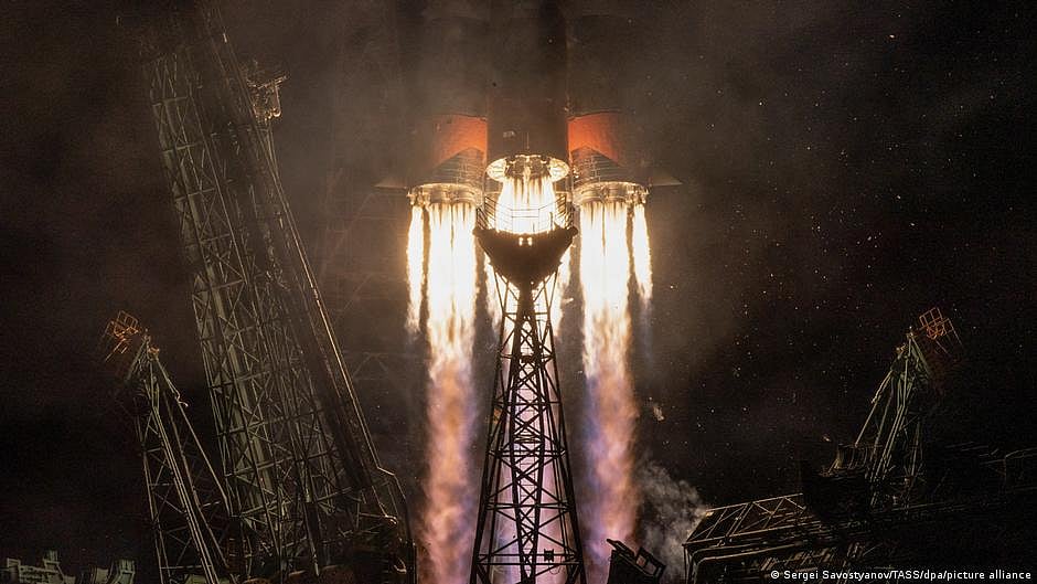 Russian Soyuz docks at ISS, cosmonauts and astronaut aboard