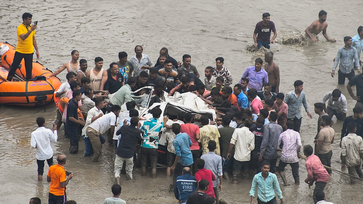 Nine killed as vehicles fall into river after bridge collapse in Vadodara