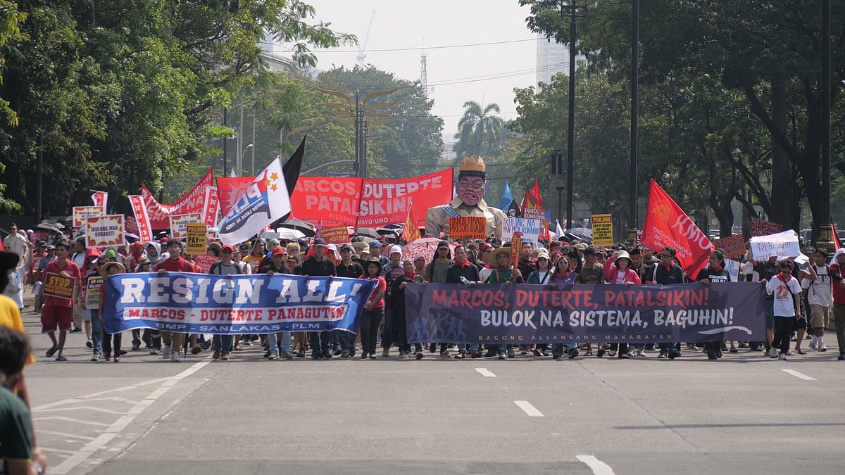 Tens of thousands rally in Manila demanding Marcos’ resignation over ...