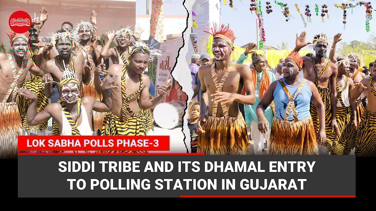 Siddi tribe makes a Dhamal entry to polling station in Gujarat