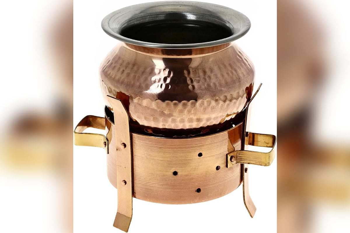 An “Angithi” or brazier is a pan or stand designed for holding burning ...