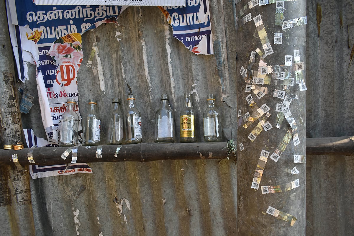 TASMAC staff foil bottle buyback scheme by not pasting hologram stickers