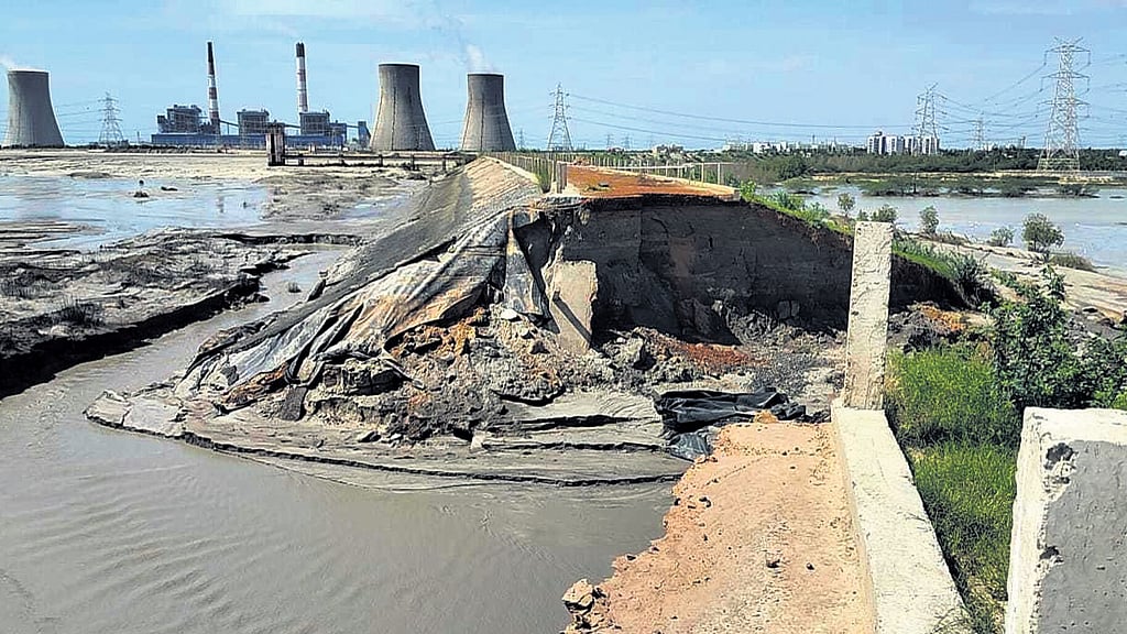 Thermal plant ash pond breach floods crop fields