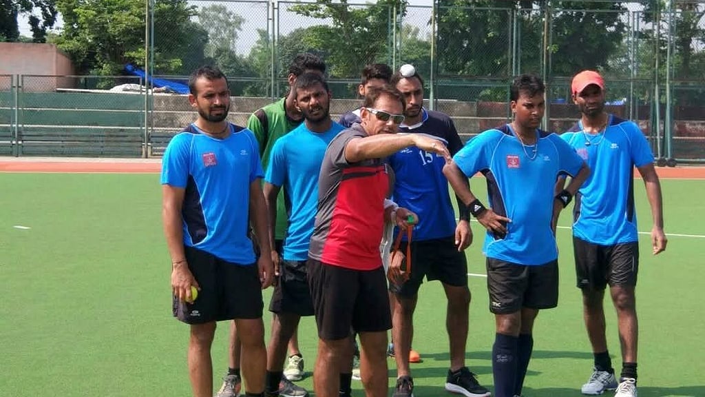 Raising the bar pays off for hockey coach Sangwan