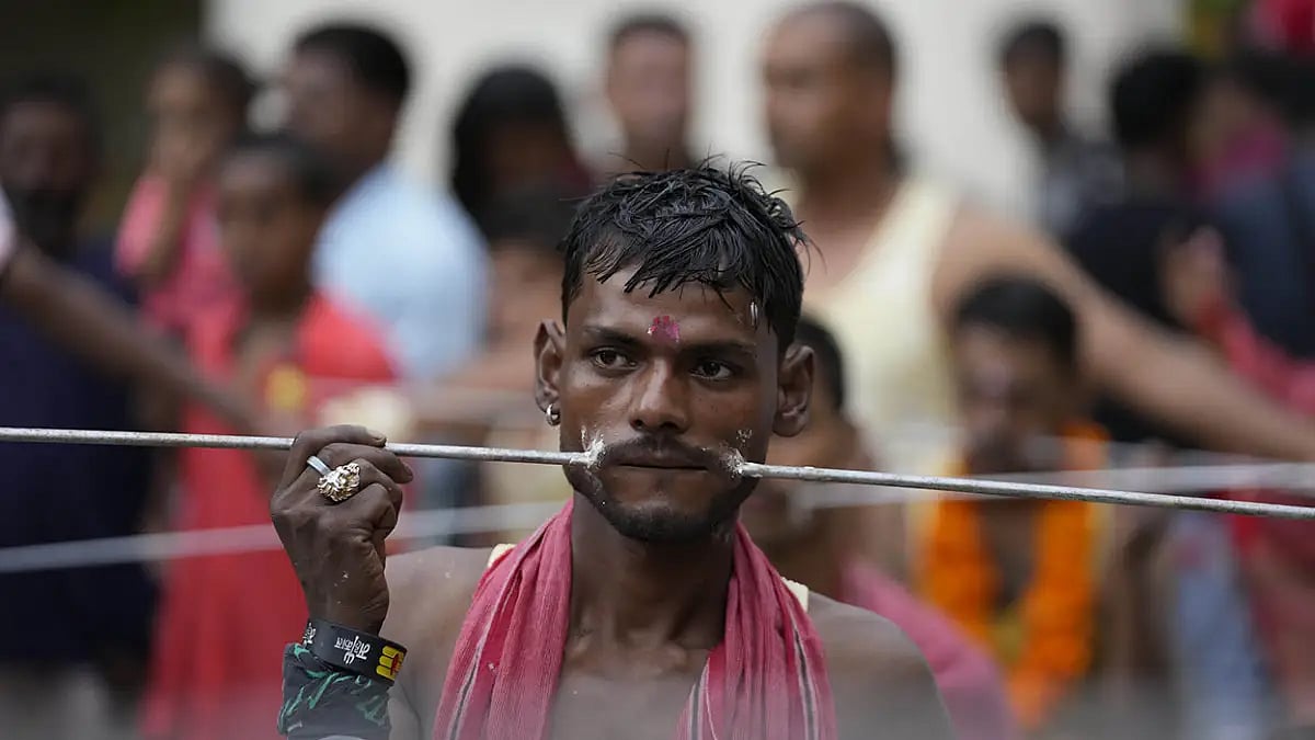 Devotees Get Pierced With Steel Tridents And Hooks During An Annual ...