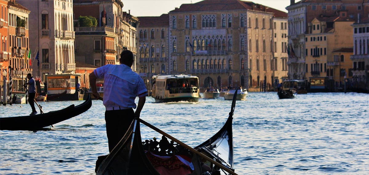 Giant Violin With Musicians Aboard Sets Sail on Grand Canal in Venice