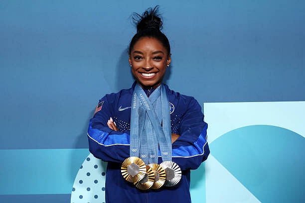 Simone Biles: From Gymnastics Champion to Philanthropist and Entrepreneur