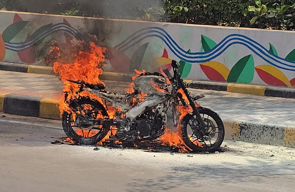 Running motorcycle catches fire in Digboi market, rider injured