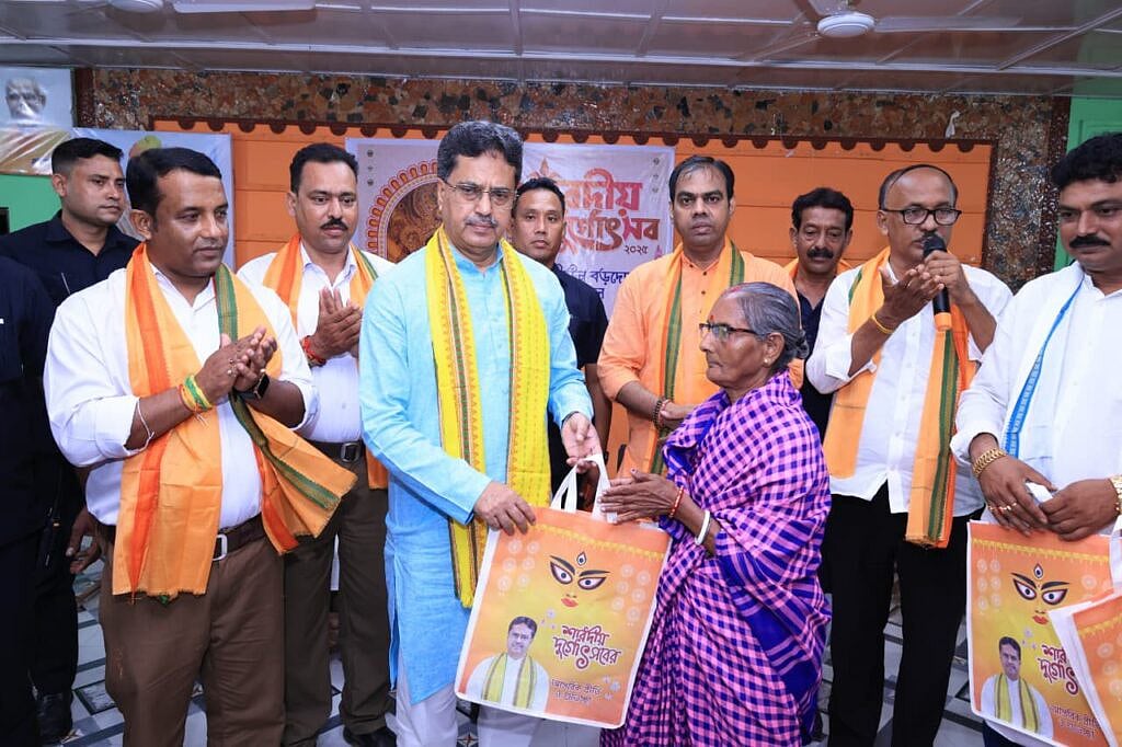 Tripura CM Saha distributes saris among women as Durga Puja begins